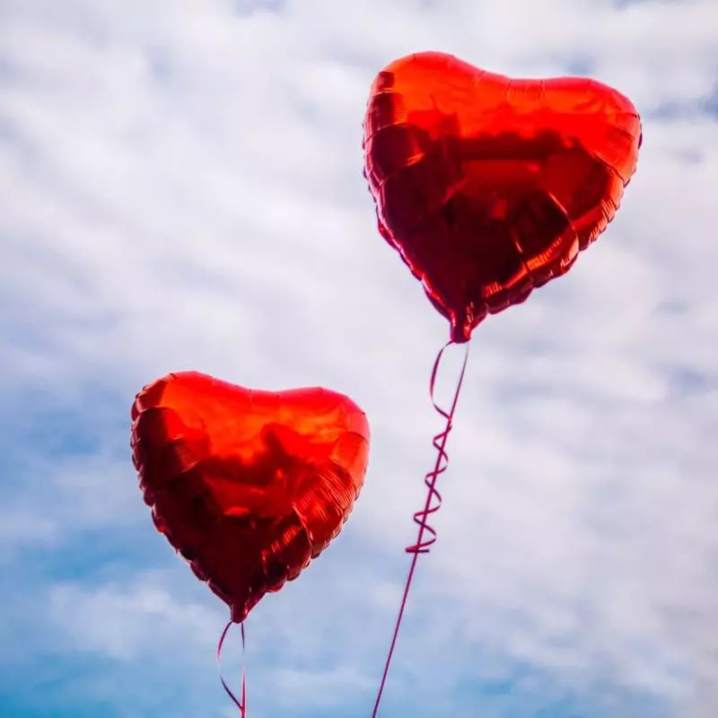Red heart balloons store